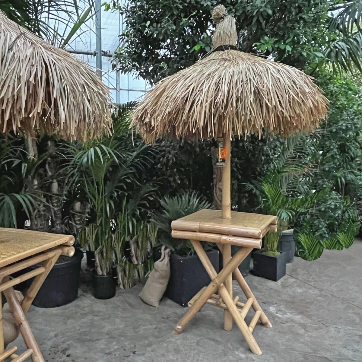 Thatched Parasol with Table and Bamboo Pole.