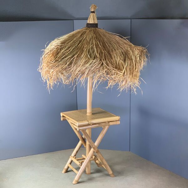 Thatched Parasol with Table and Bamboo Pole.