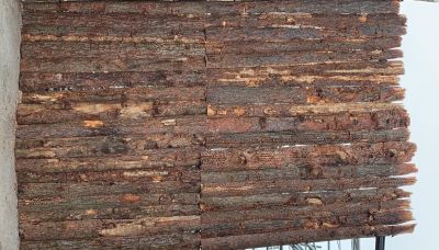 Bark On Rustic Cladding.