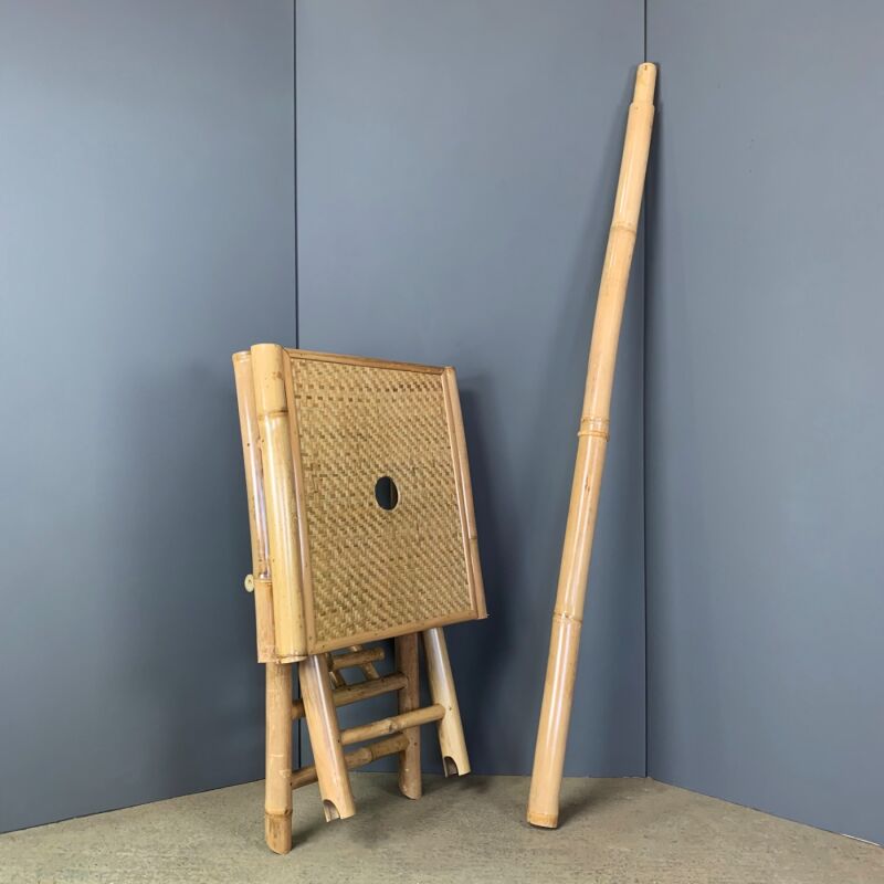 Thatched Parasol with Table and Bamboo Pole.