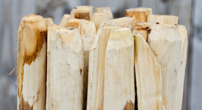 Chestnut poles with a triangular section approximately 2 -3" wide by 4 ...